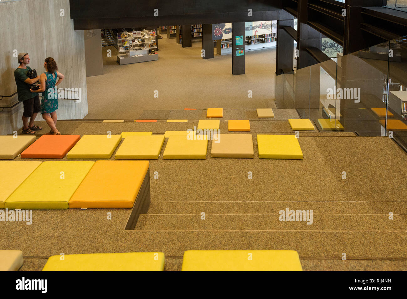 inside the new public library De Krook with bookshelves and lounge in ...