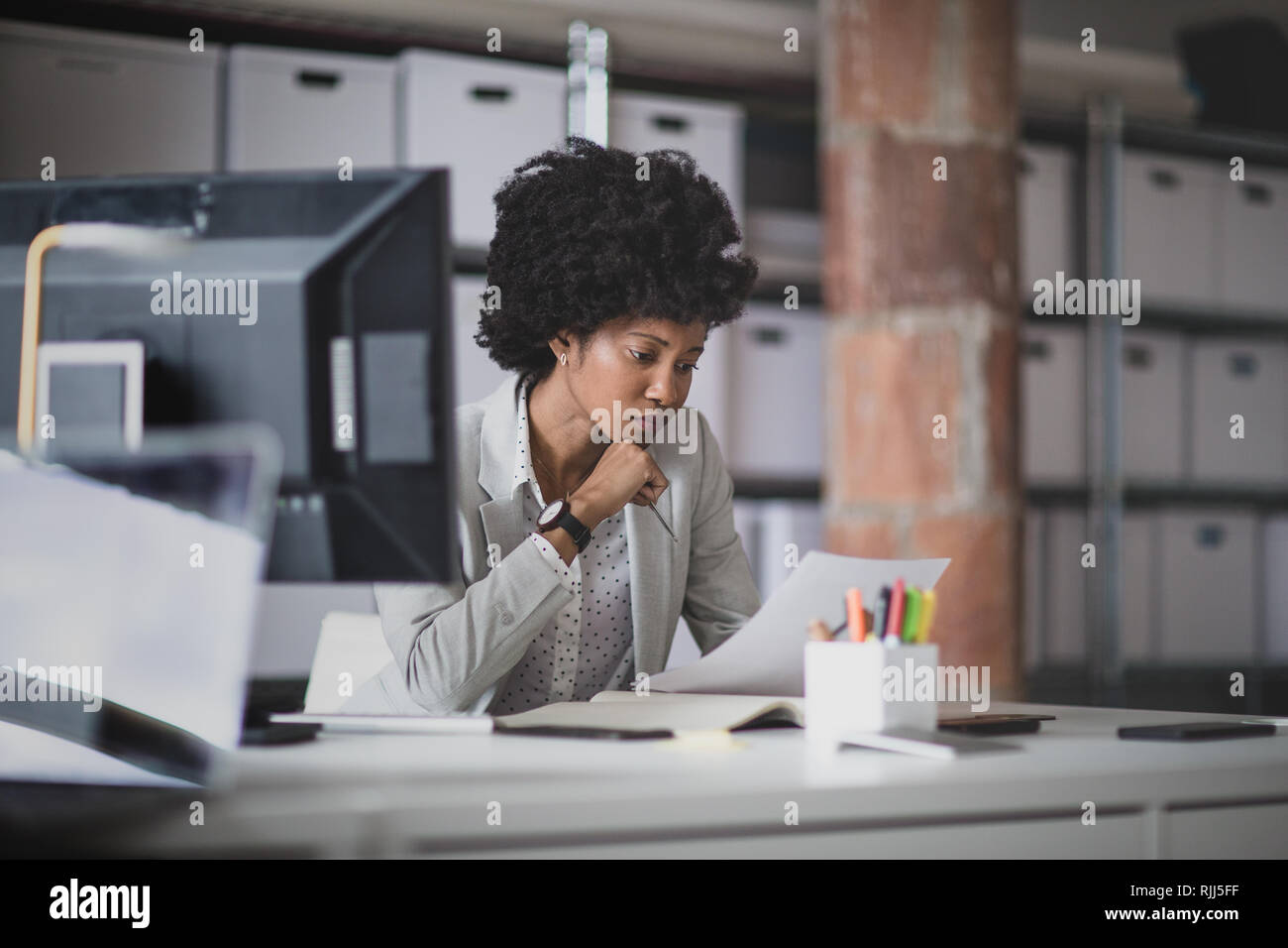 Female office desk paperwork hi-res stock photography and images - Alamy
