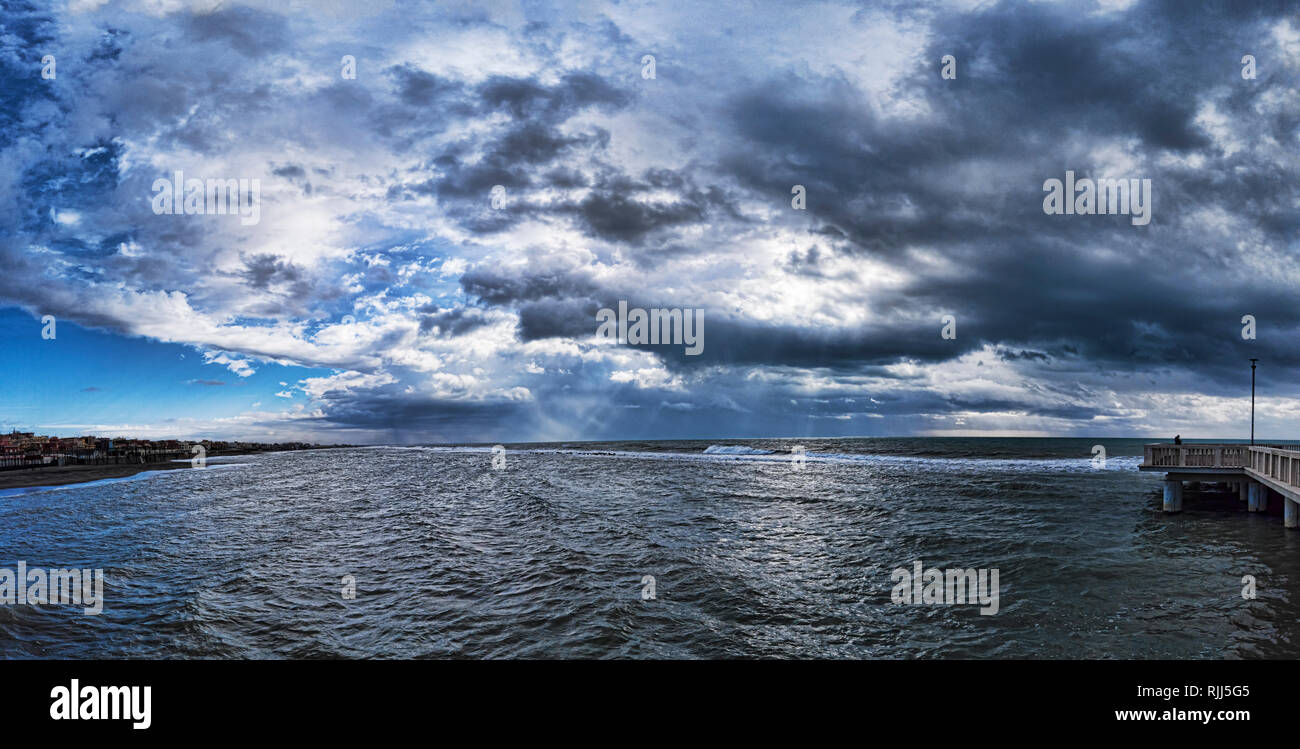 Scenic spooky cloudy sky and rough sea in a cold winter day in the ...