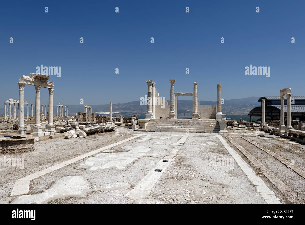 View of the courtyard portico of Temple A which is in the background ...