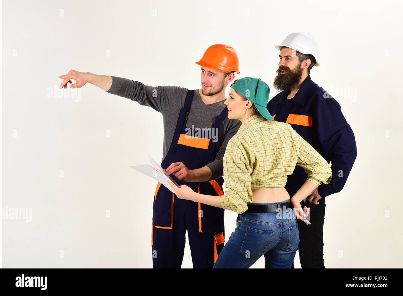 Teamwork in action. Professional people working on construction design ...