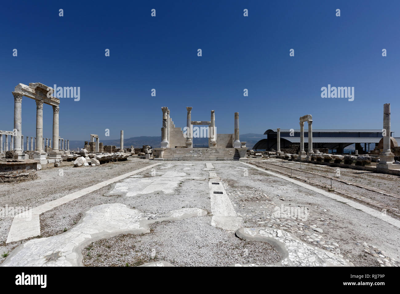 View of the courtyard portico of Temple A which is in the background ...