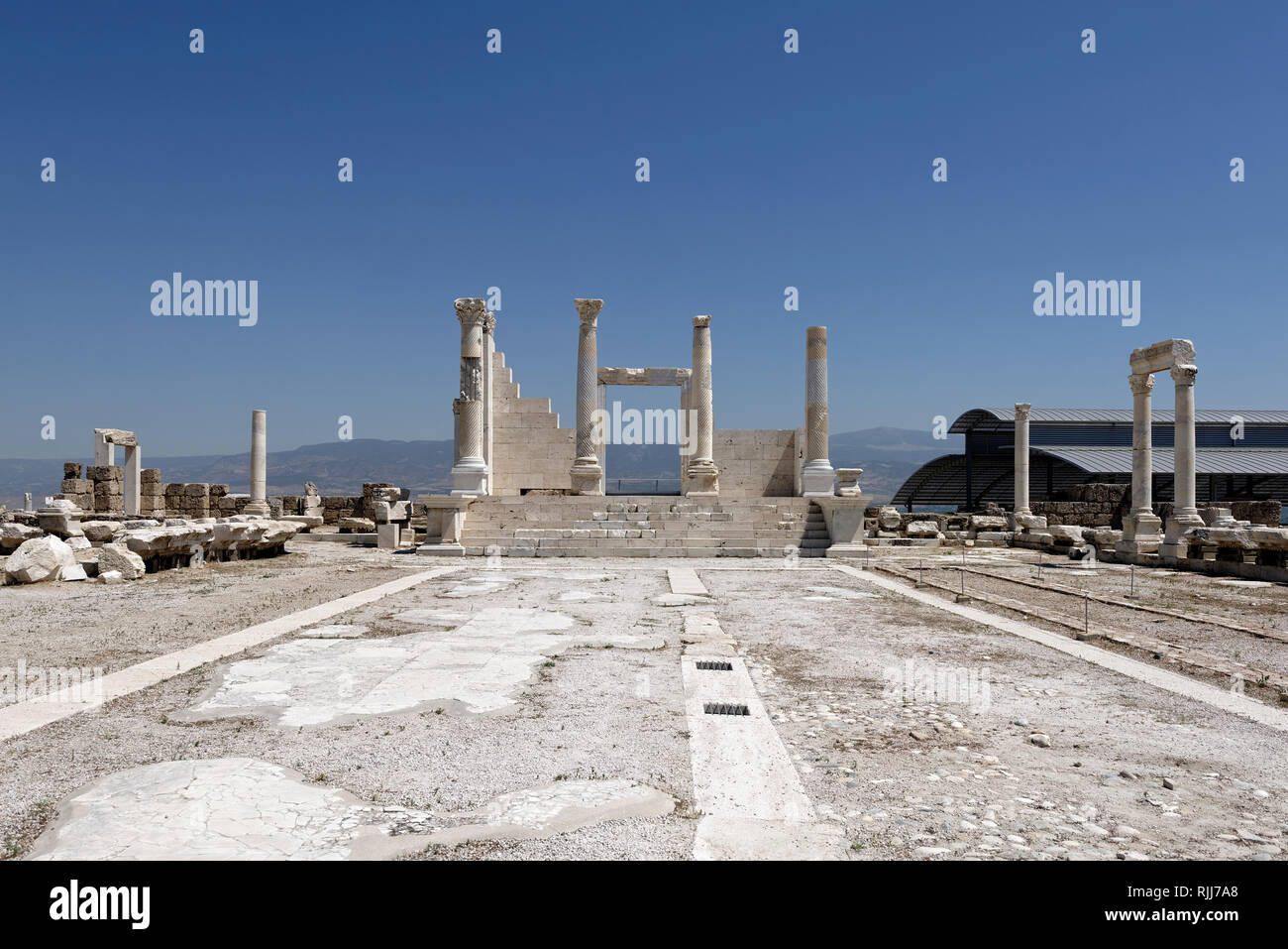 View of the courtyard portico of Temple A which is in the background ...