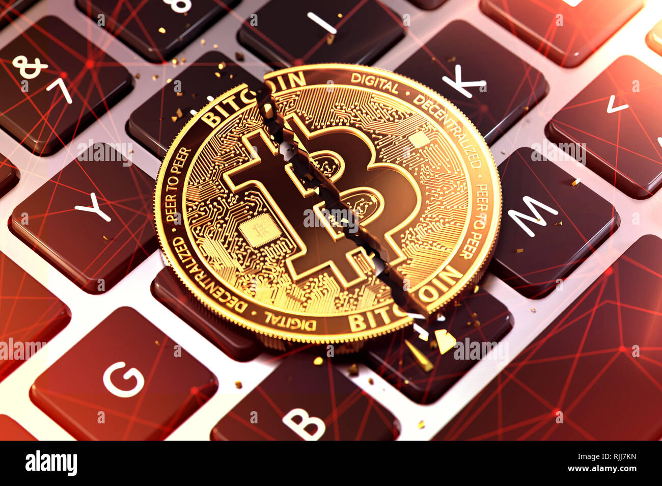 Close-up shot of Bitcoin split in two pieces on keyboard ...