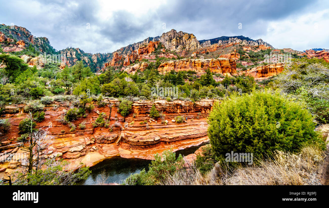 The colorful sandstone mountains and canyon carved by Oak Creek at ...