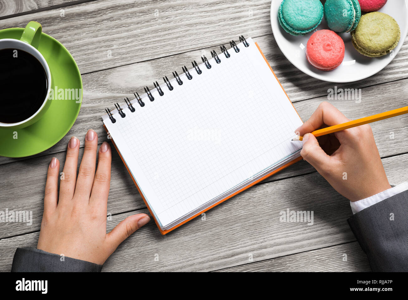 Businesswoman making some notes Stock Photo - Alamy