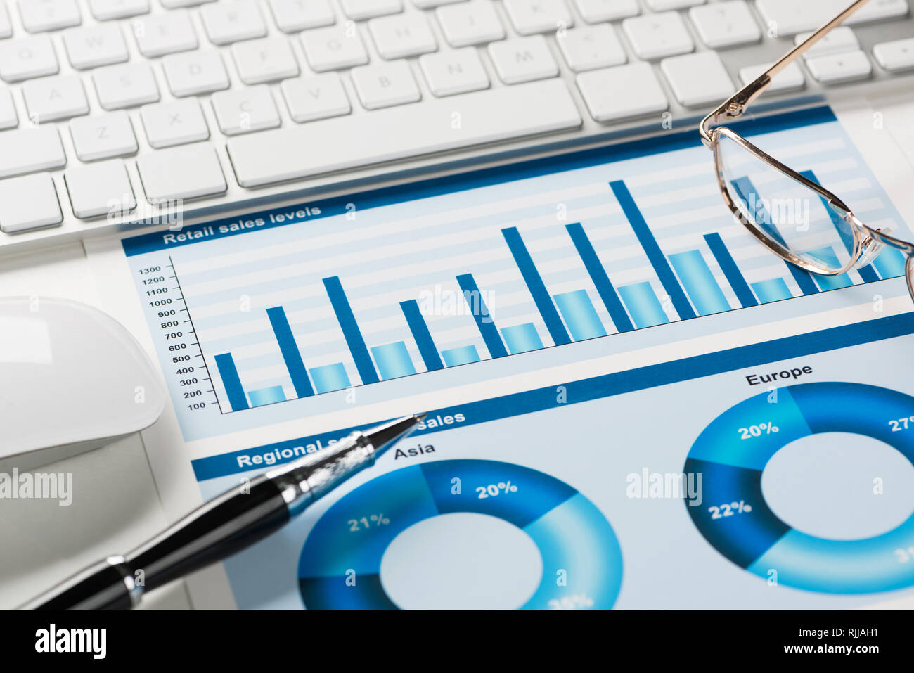 Preparing average sales report Stock Photo - Alamy