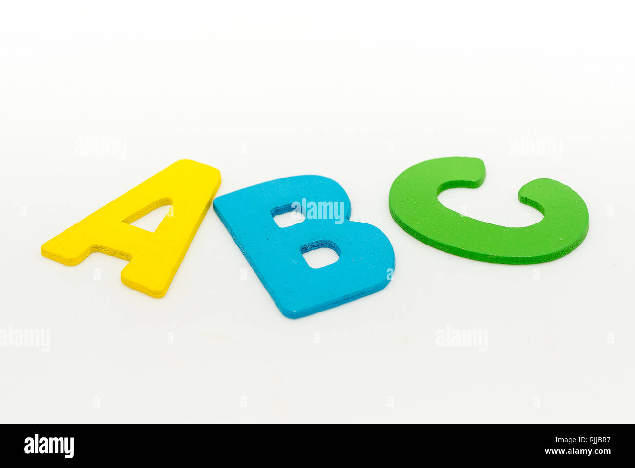 Wooden ABC Letters Isolated on White Background Stock Photo - Alamy