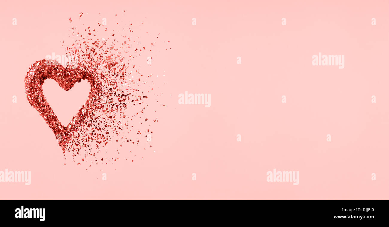 Glitter heart dissolving into pieces on pink background. Valentines day ...