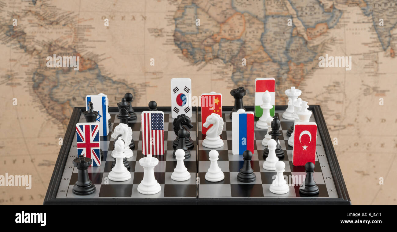 Country flag symbols on the chessboard with figures on the background ...