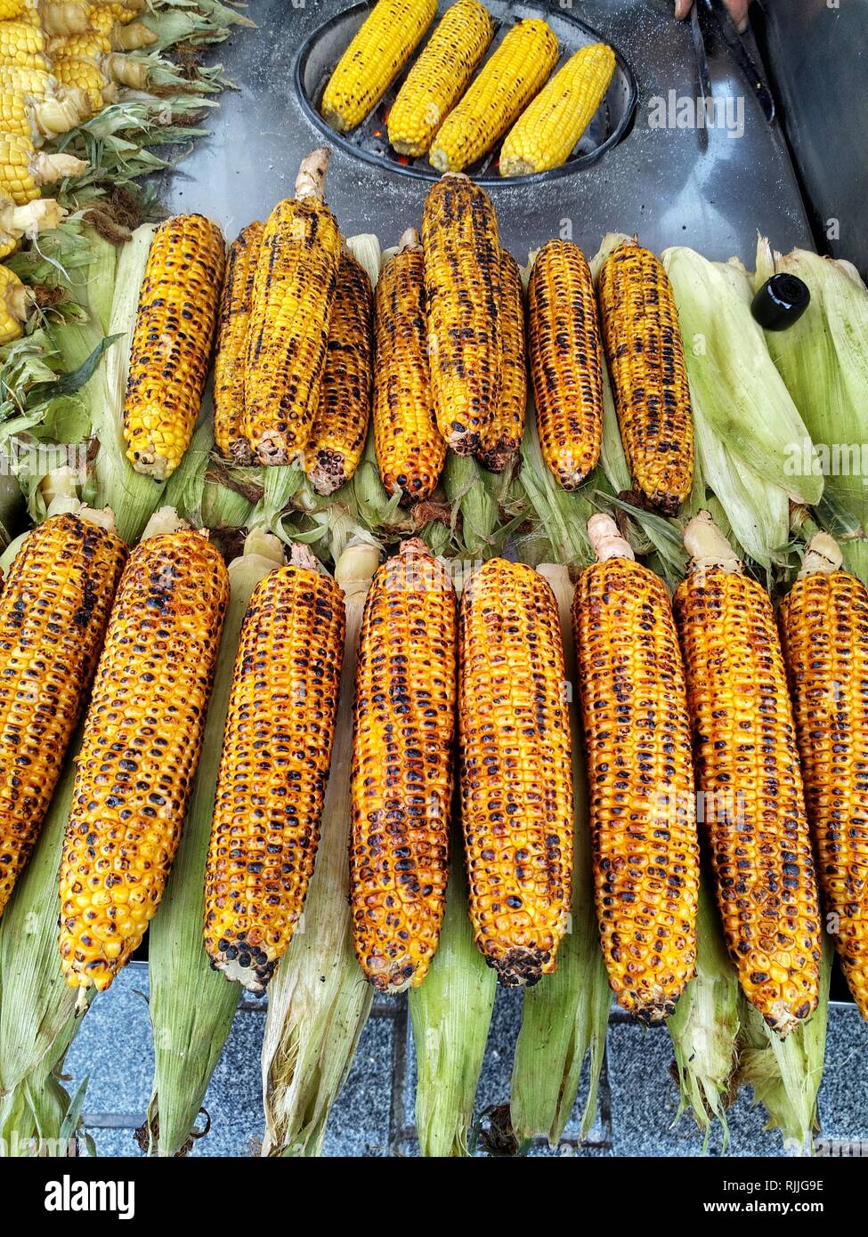 Fried corn as a snack. Traditional Istanbul street food Stock Photo - Alamy