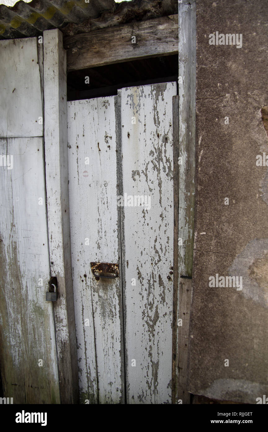 Derelict door on a tomb in La Recoleta Cemetery in Buenos Aires ...