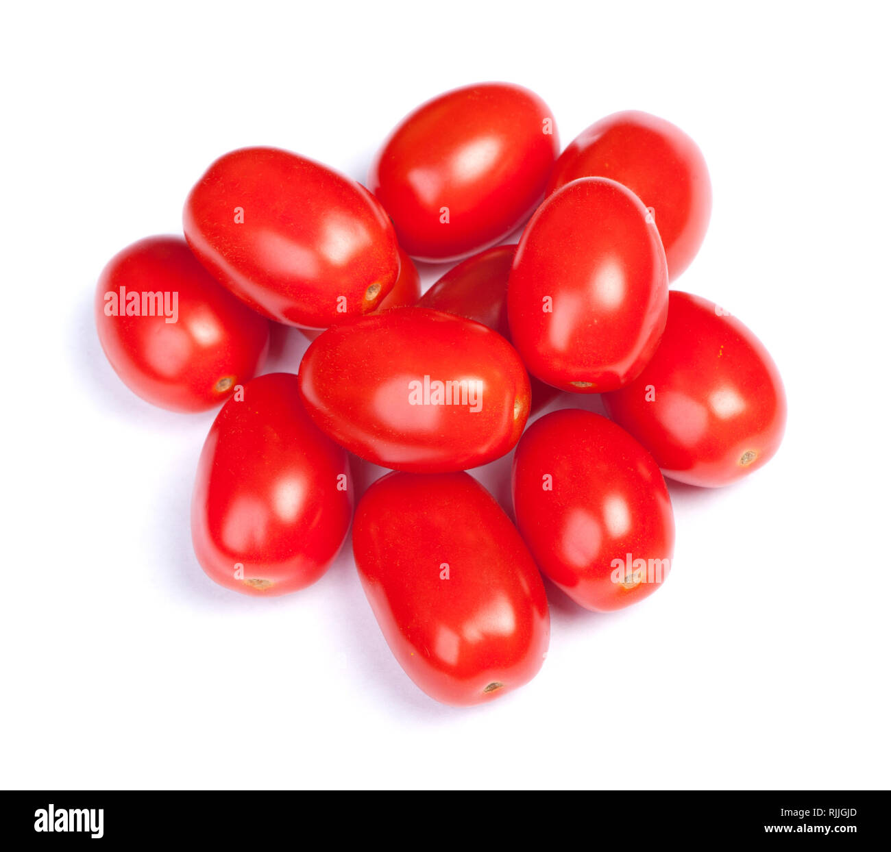 Heap of cherry tomatoes isolated on white background Stock Photo - Alamy