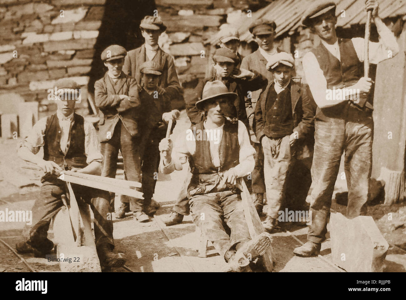 An old photograph showing workers at Dinorwic (Dinorwig) slate quarry ...