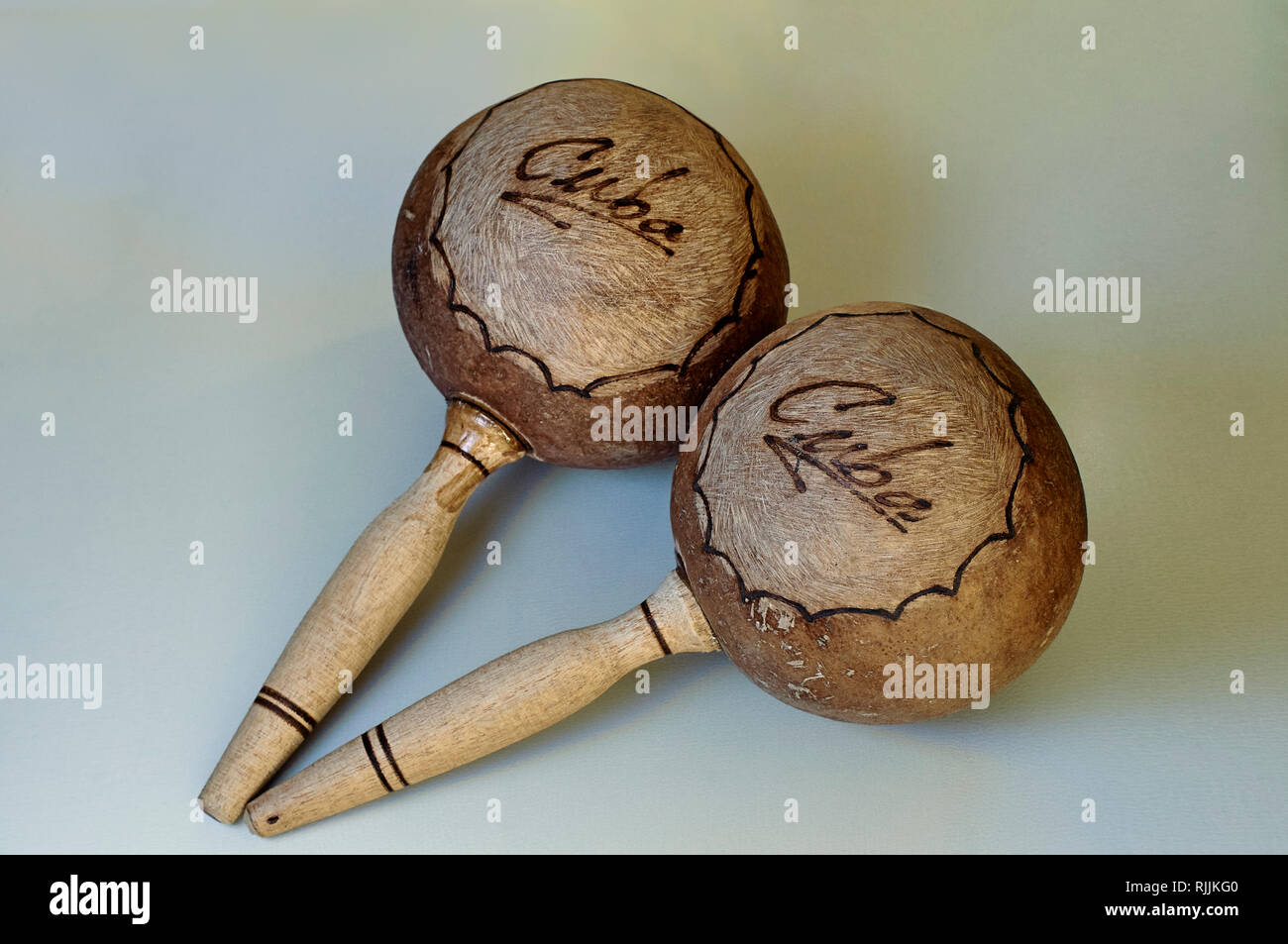 Pair of maracas made of leather and wood with the word Cuba printed ...