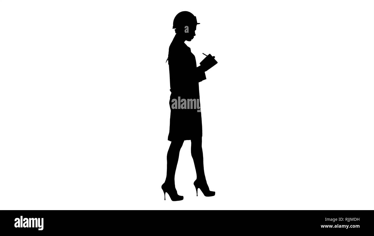 Silhouette Woman engineer with helmet is holding pen and checklist ...