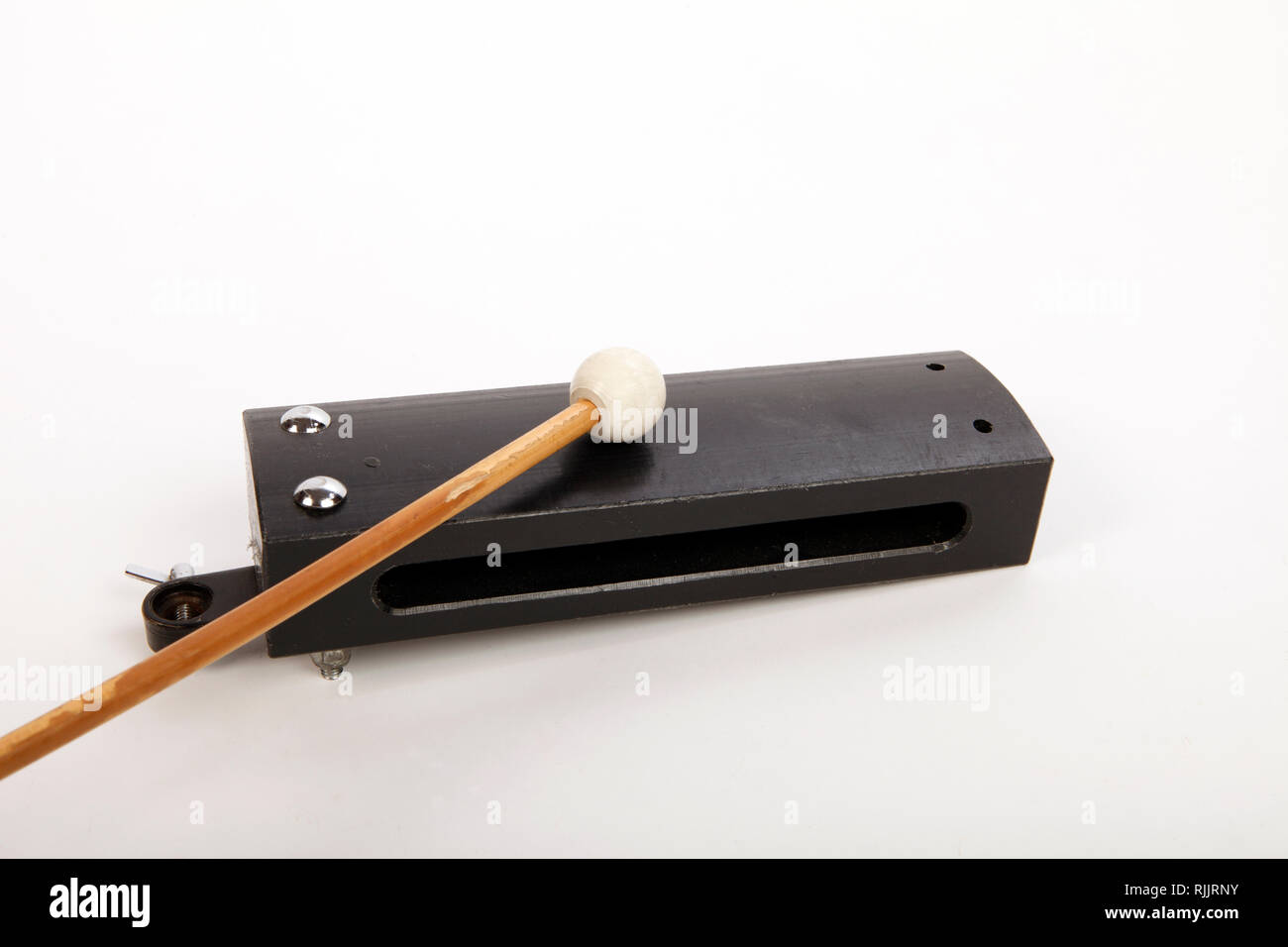 man-made mounted polyblock wood block, with hard beater Stock Photo - Alamy