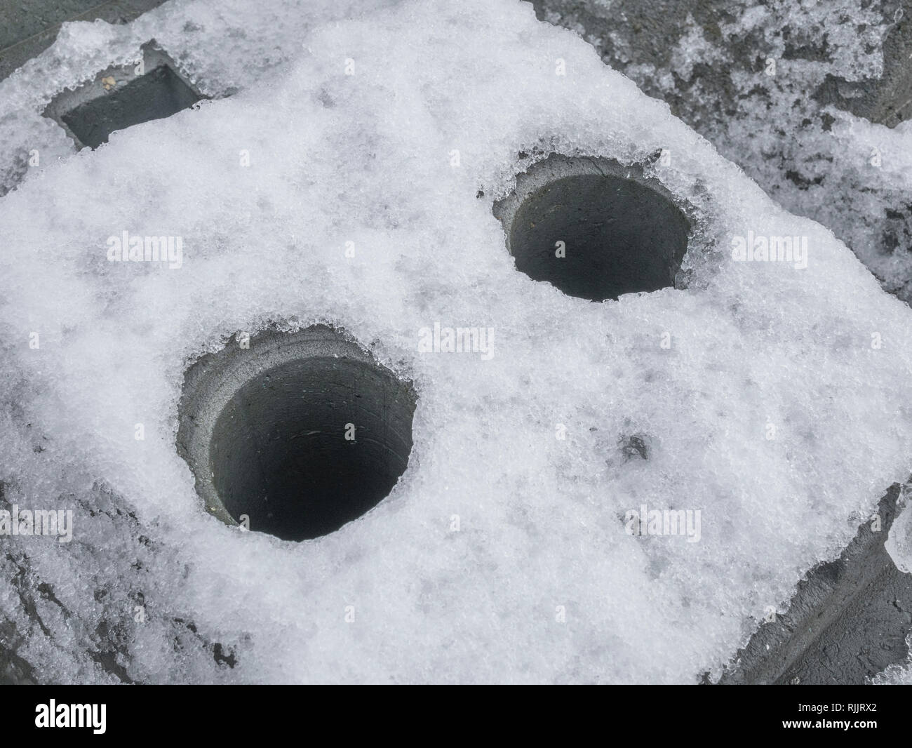 Winter snow settled on industrial object Stock Photo - Alamy