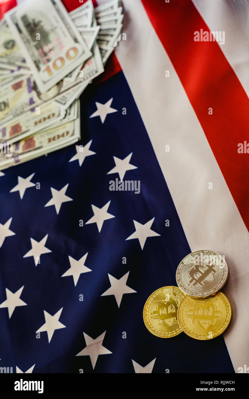 Bitcoins and american dollar bills with US flag background, copy space ...