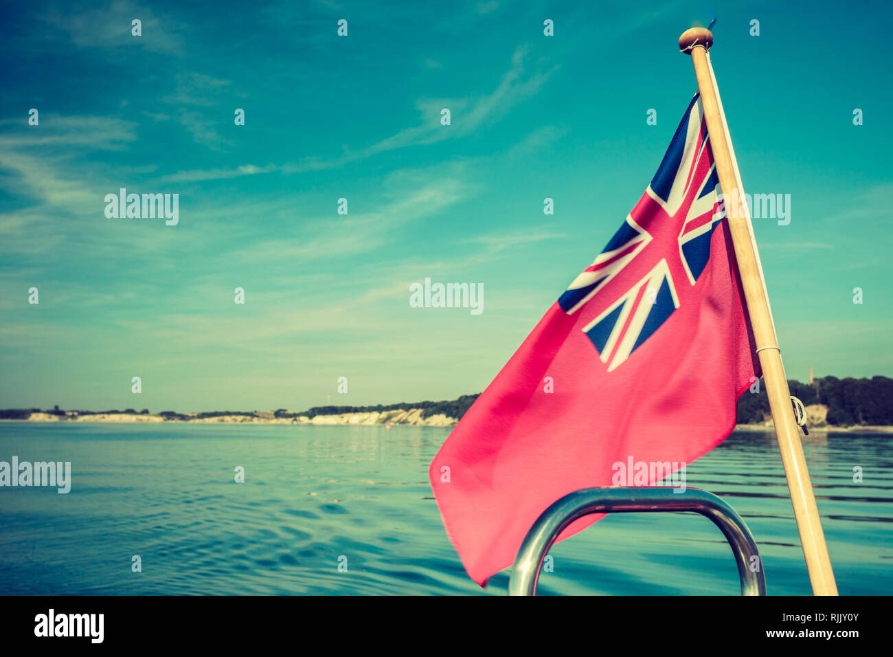 The uk red ensign the british maritime flag flown from yacht sail boat ...
