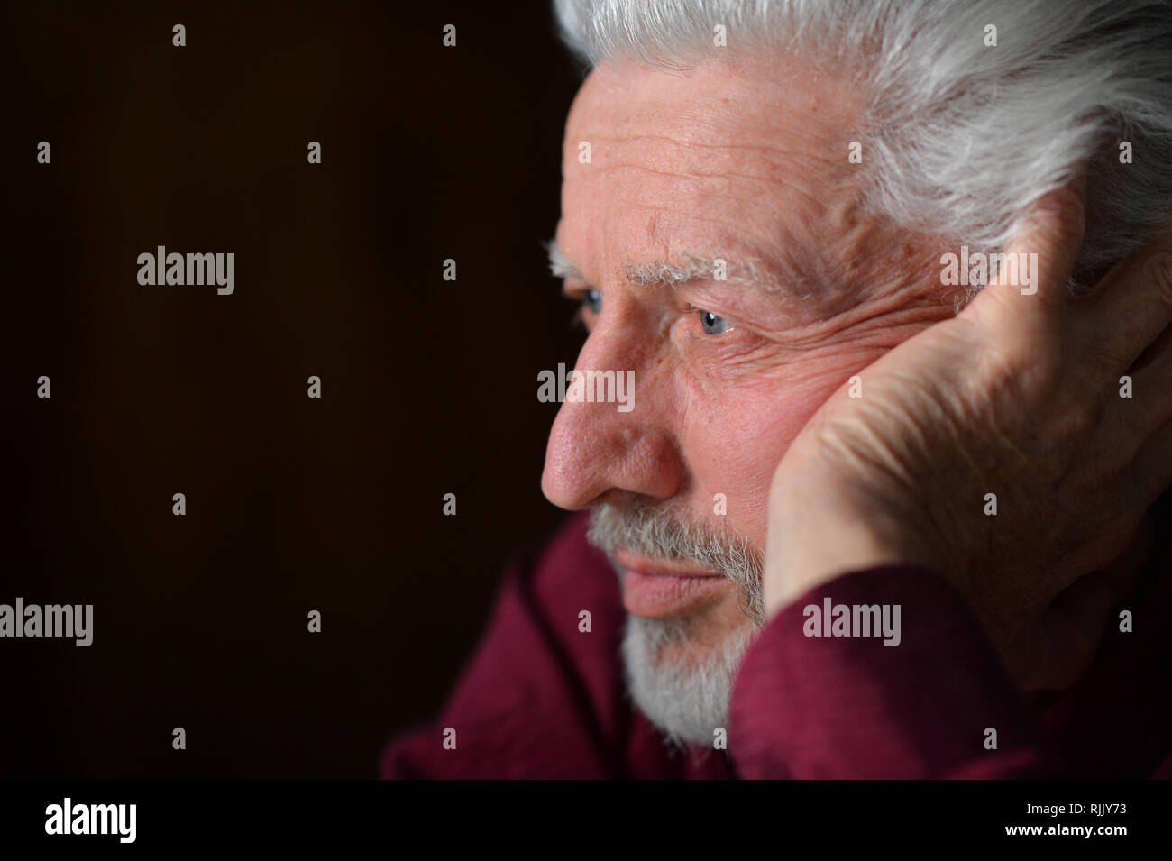 Close up portrait of sad senior man posing Stock Photo - Alamy