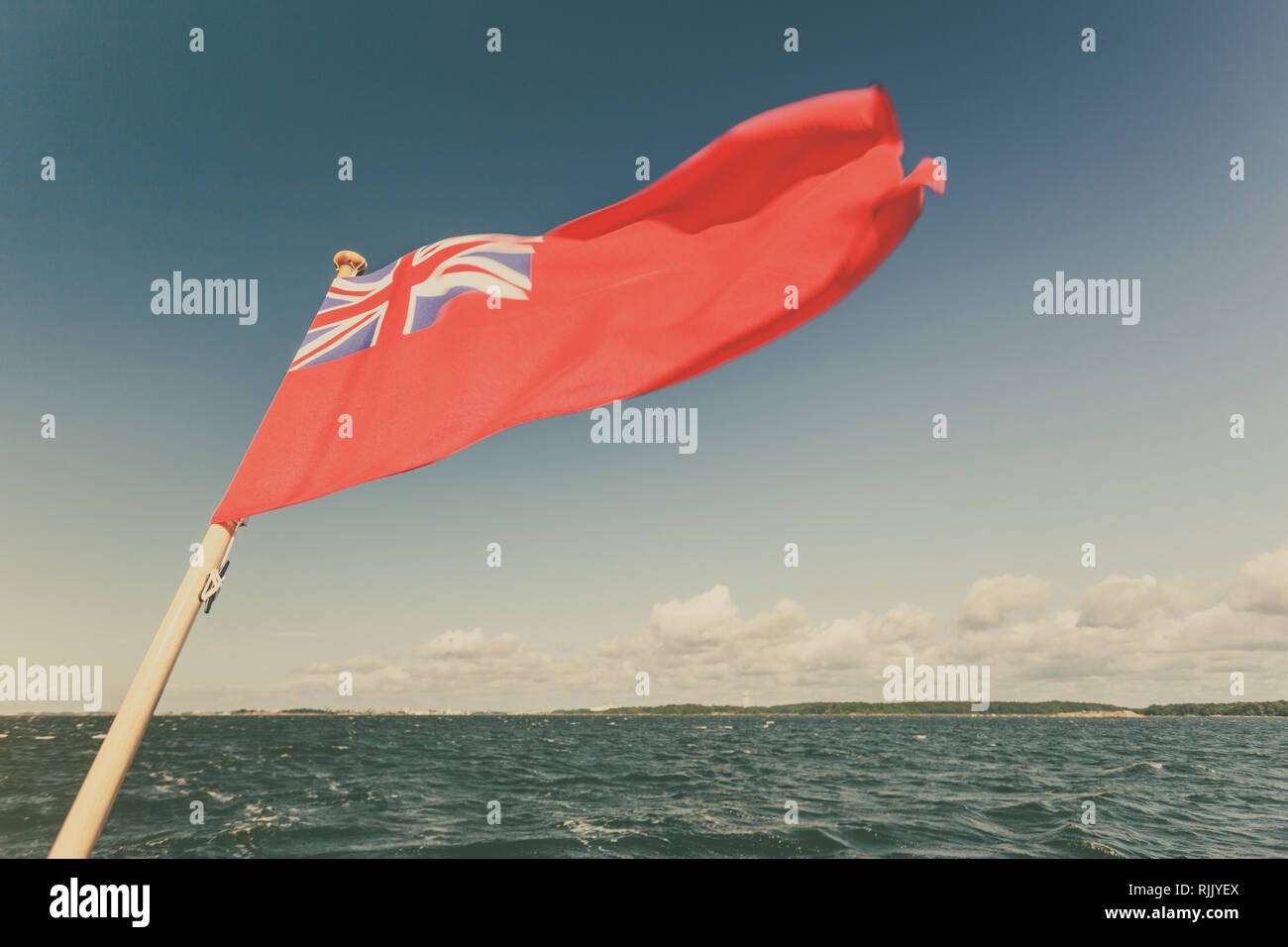 The uk red ensign the british maritime flag flown from yacht sail boat ...