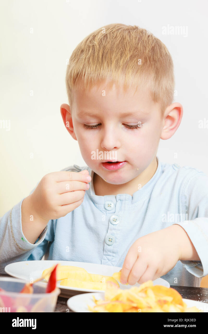 Morning routine in family, healthy diet for children concept. Little ...