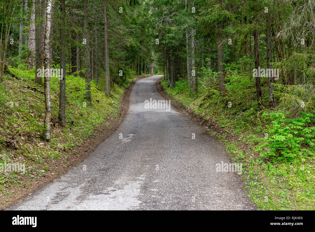empty asphalt road outside city. countryside driveway with clean ...