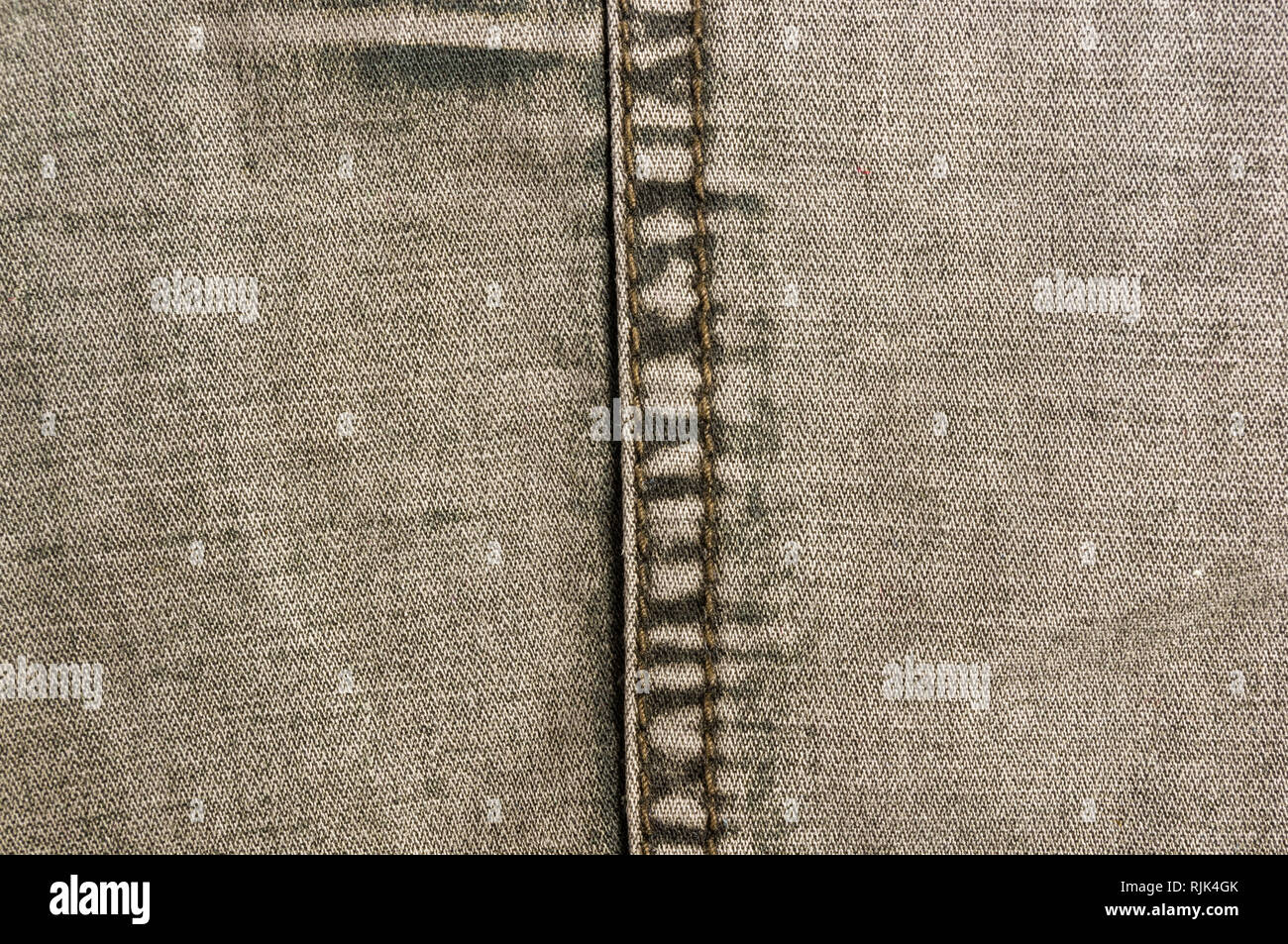clothing items washed cotton fabric texture with seams, macro, close-up ...