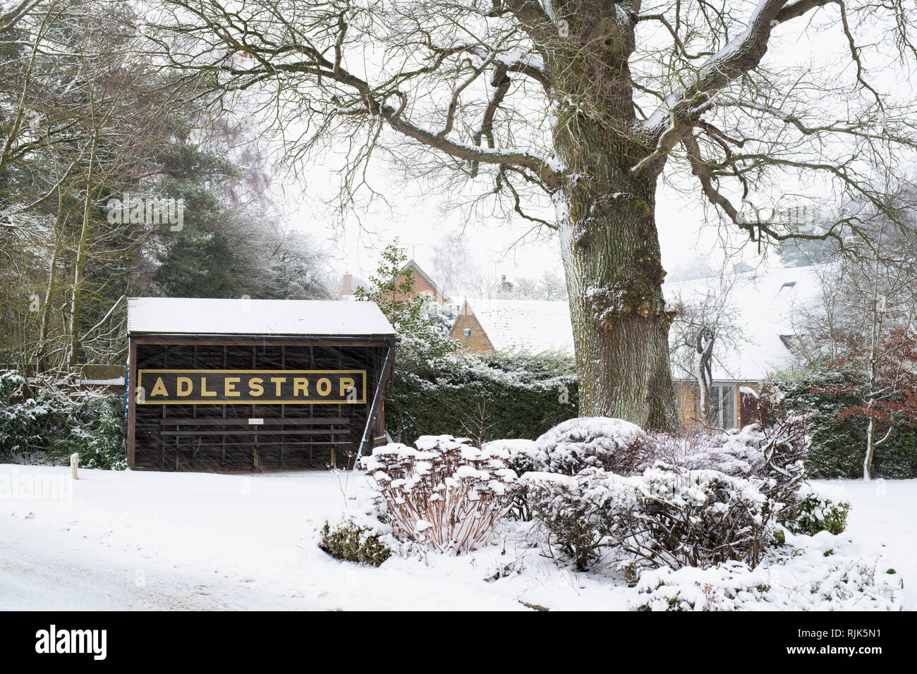 Adlestrop village sign and bus shelter in the winter snow. Adlestrop ...