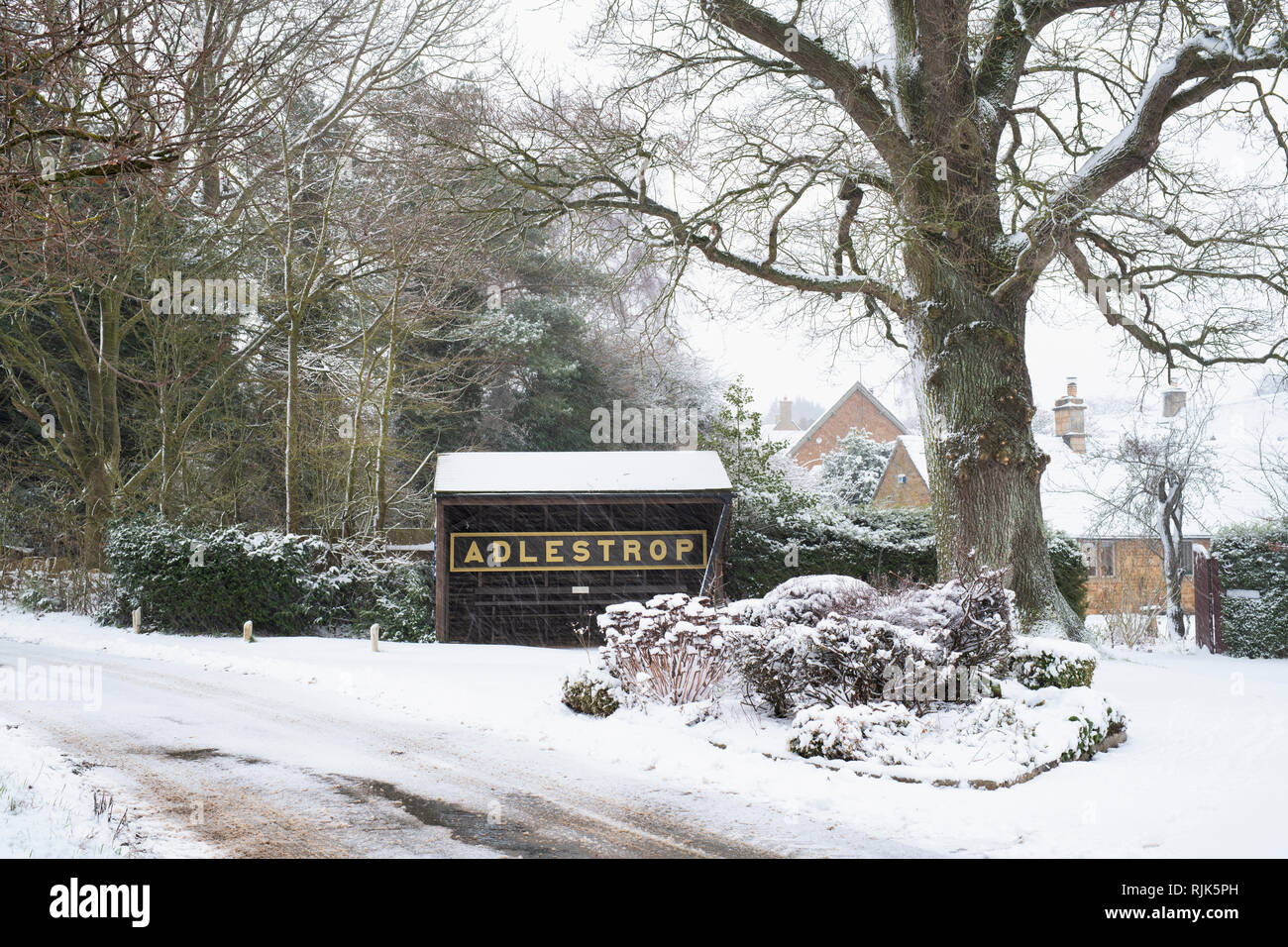 Adlestrop village sign and bus shelter in the winter snow. Adlestrop ...