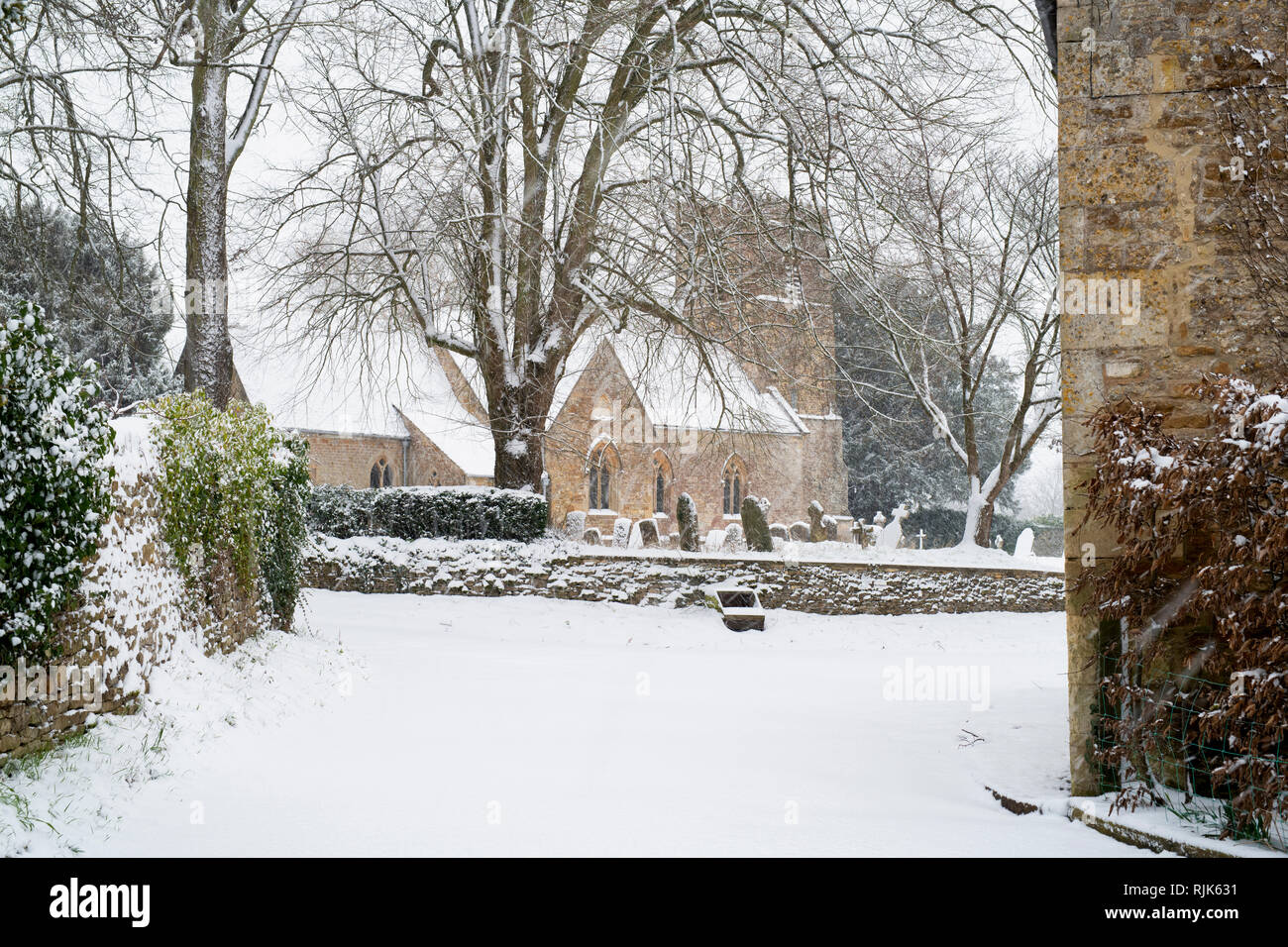 St Mary Magdalene church in the winter snow. Adlestrop. Cotswolds ...