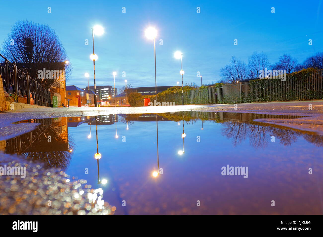Reflections in puddles hi-res stock photography and images - Alamy