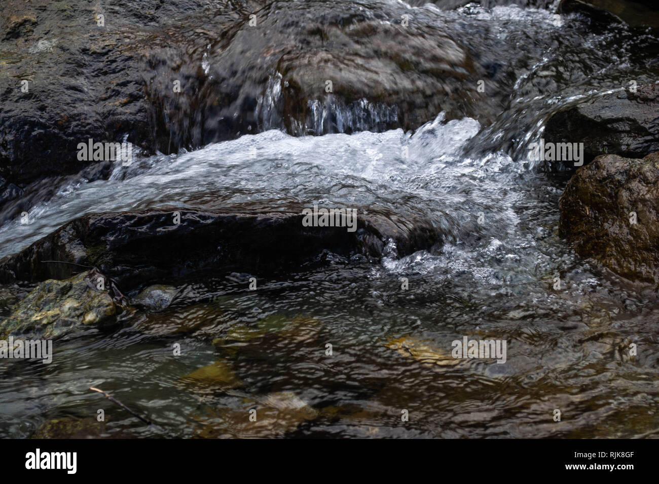 Rapid river stream over stones hi-res stock photography and images - Alamy