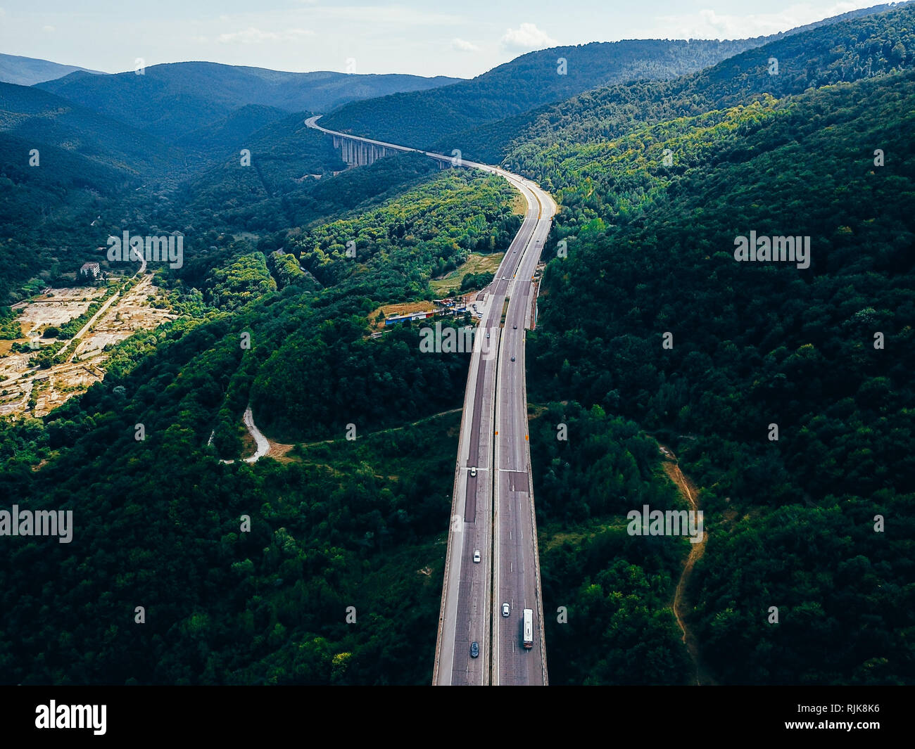 Aerial view of the road in the mountains Stock Photo - Alamy