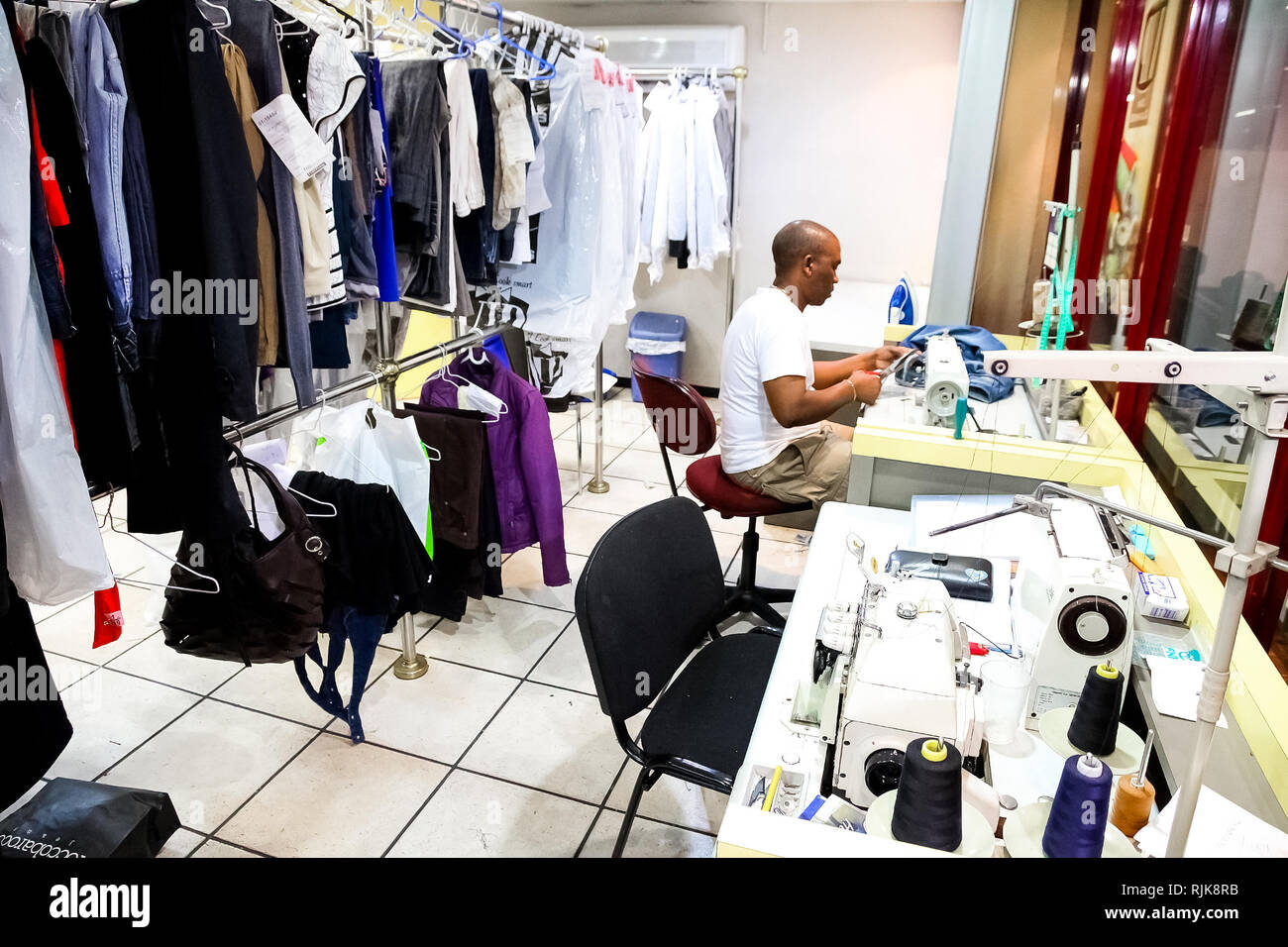 Johannesburg, South Africa - April 27 2011: African Man repairing ...