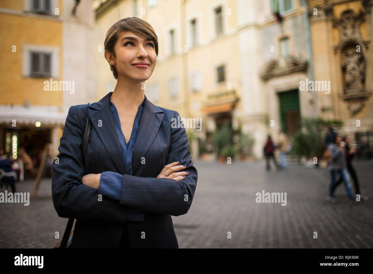 Well dressed woman standing outside hi-res stock photography and images ...