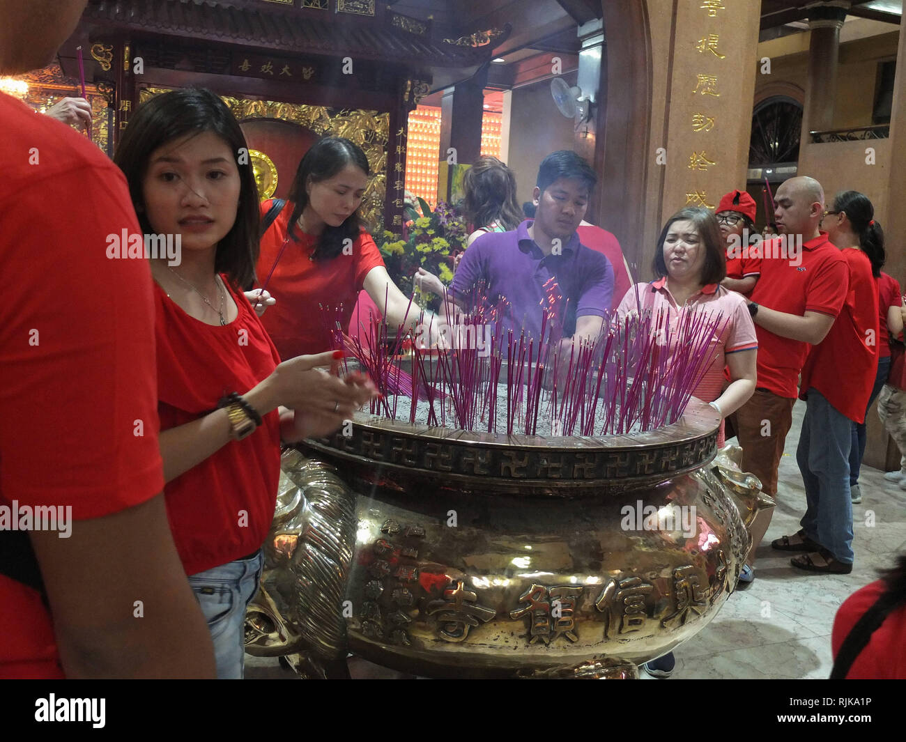 Manila, Philippines. 27th Apr, 2012. Filipino Chinese are seen lighting ...