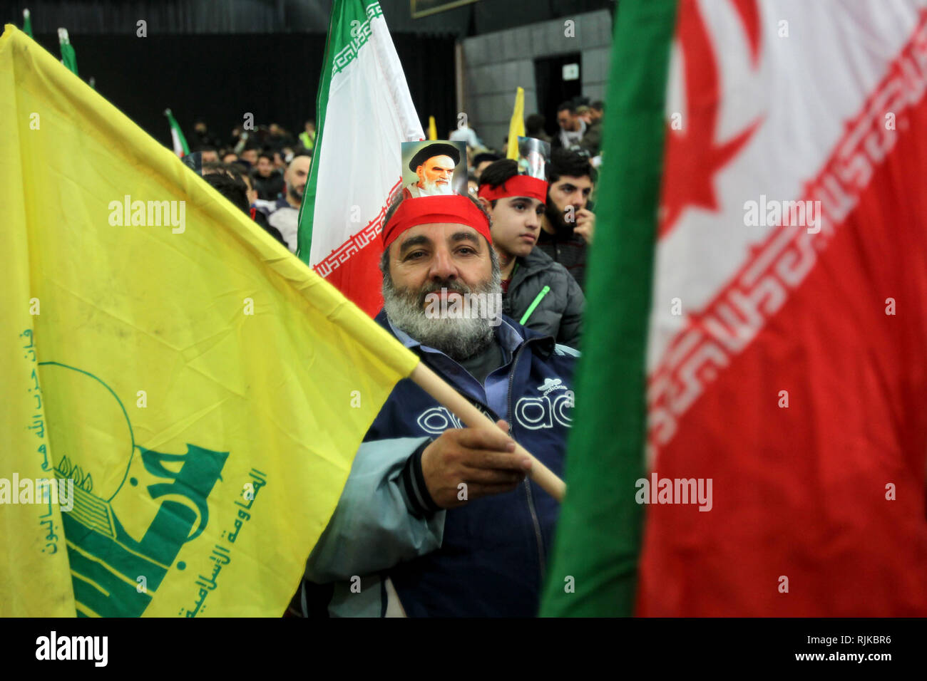 06 February 2019, Lebanon, Beirut: A man with a picture, strapped to ...
