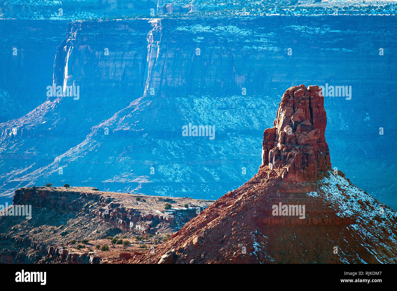 January 2019: A towering spire above the snow covered red sandstone ...