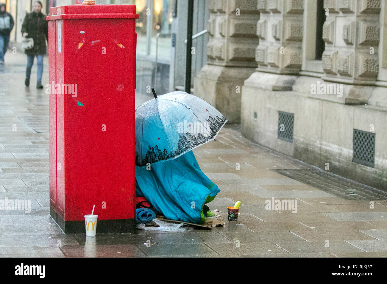 Preston, Lancashire. 7th February, 2019. UK Weather. People passing ...