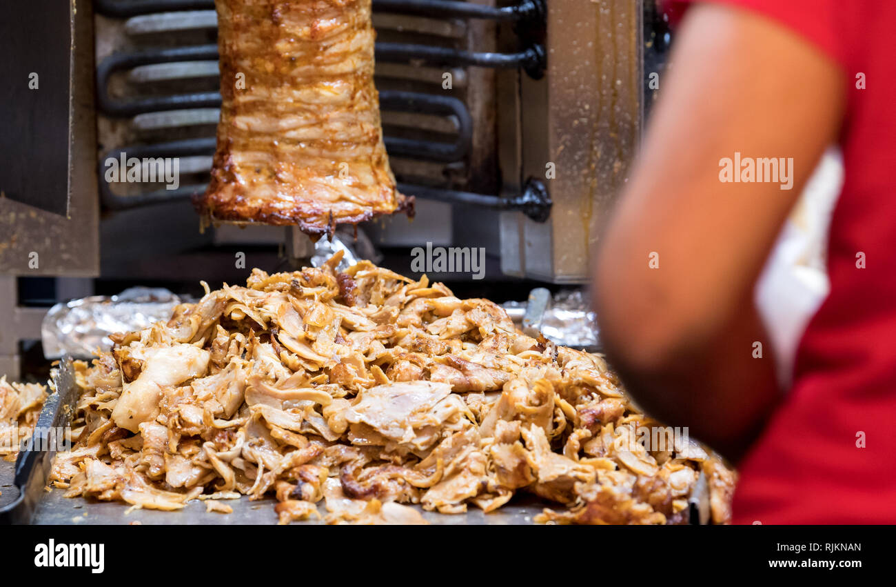 07 February 2019, Bavaria, München: Cut off kebab meat lies in a snack ...