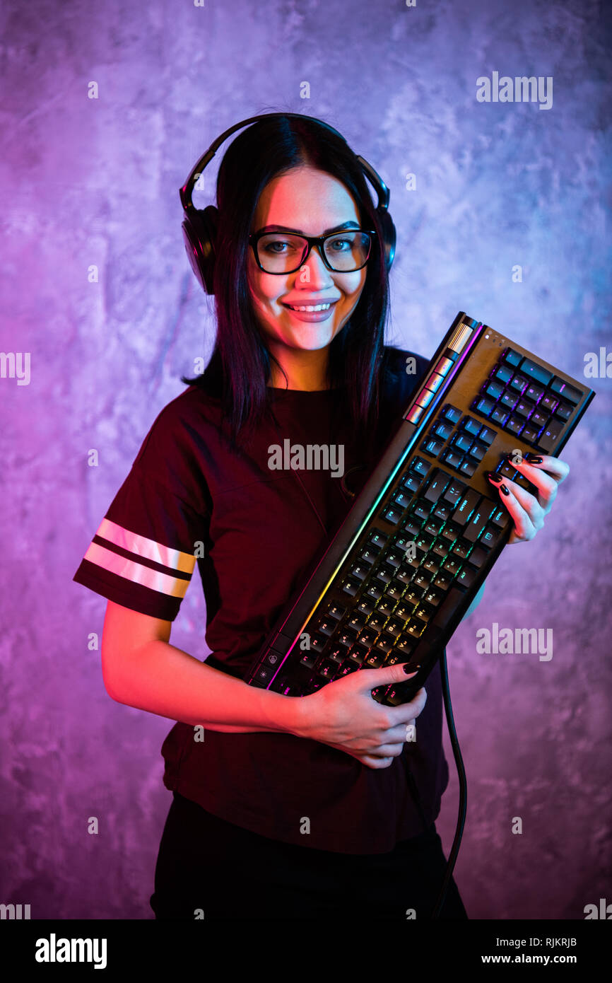 Beautiful Friendly Pro Gamer Streamer Girl Posing With a Keyboard in ...
