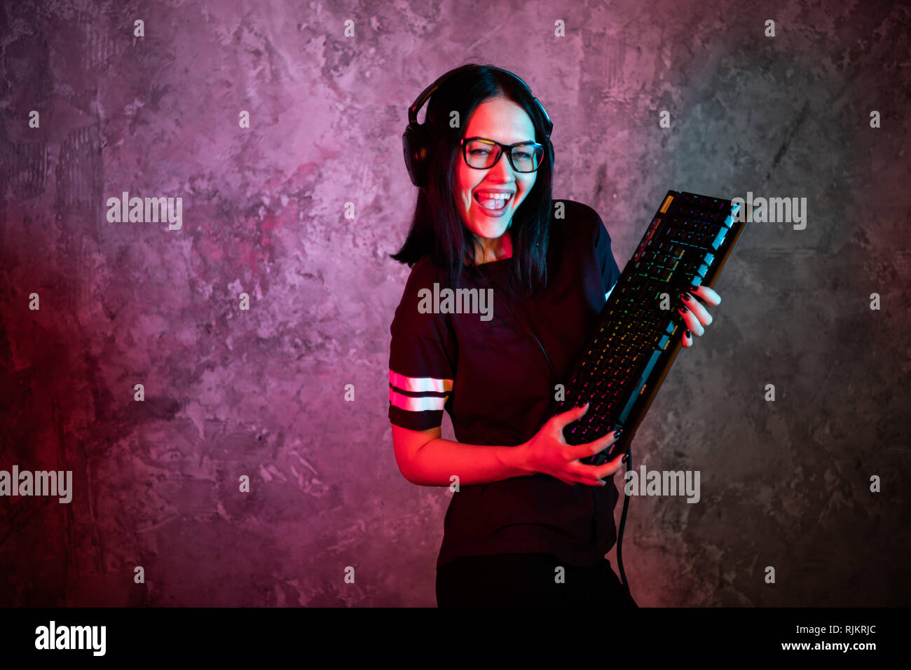 Beautiful Friendly Pro Gamer Streamer Girl Posing With a Keyboard in ...