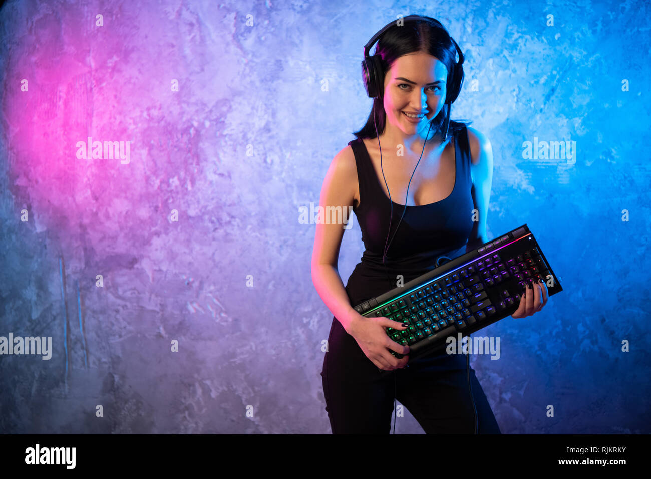 Beautiful Friendly Pro Gamer Streamer Girl Posing With a Keyboard in ...