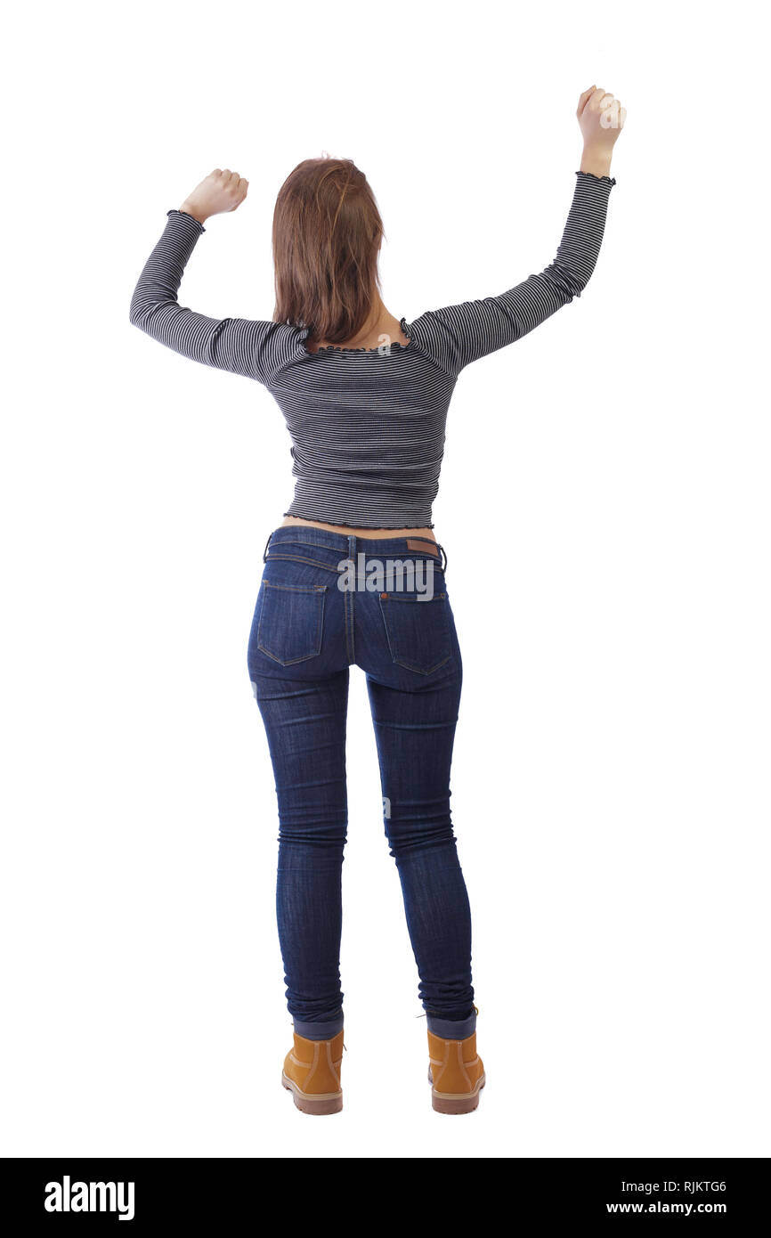 back view of dancing young beautiful woman. girl watching. Rear view ...