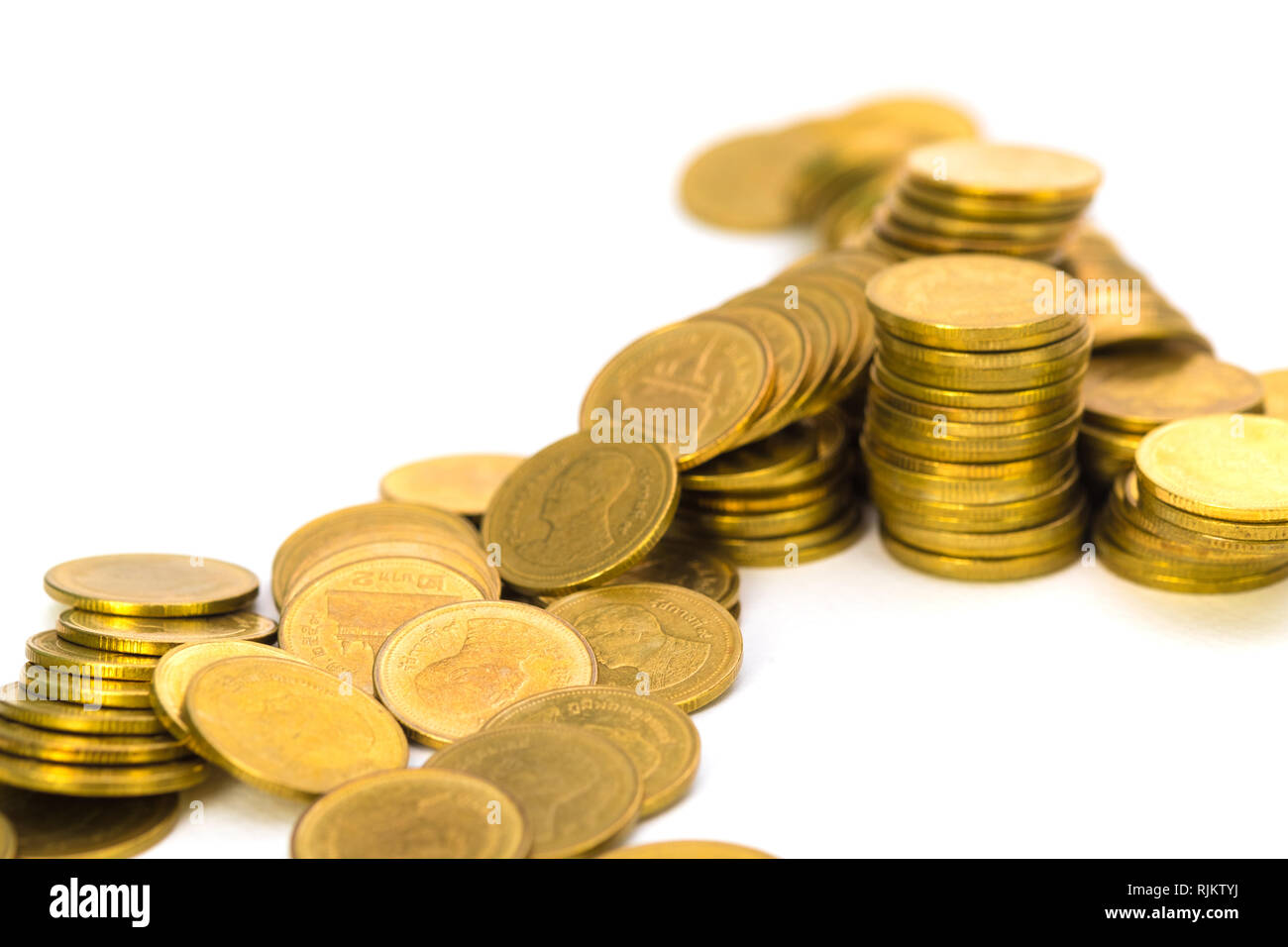 Columns of coins, piles of coins on white background, business and ...