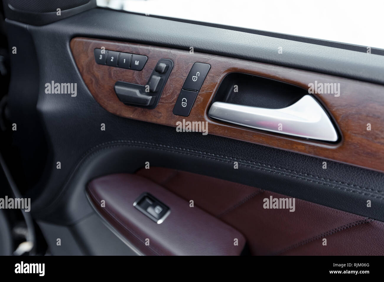 Door panel with power window controller. Detail of the car interior ...