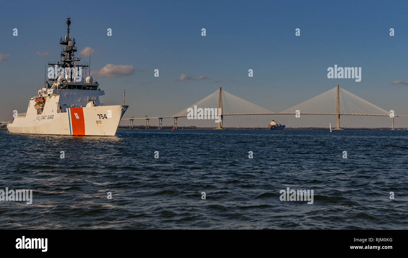 U.S. Coast Guard Cutter James navigates through the Charleston Harbor ...