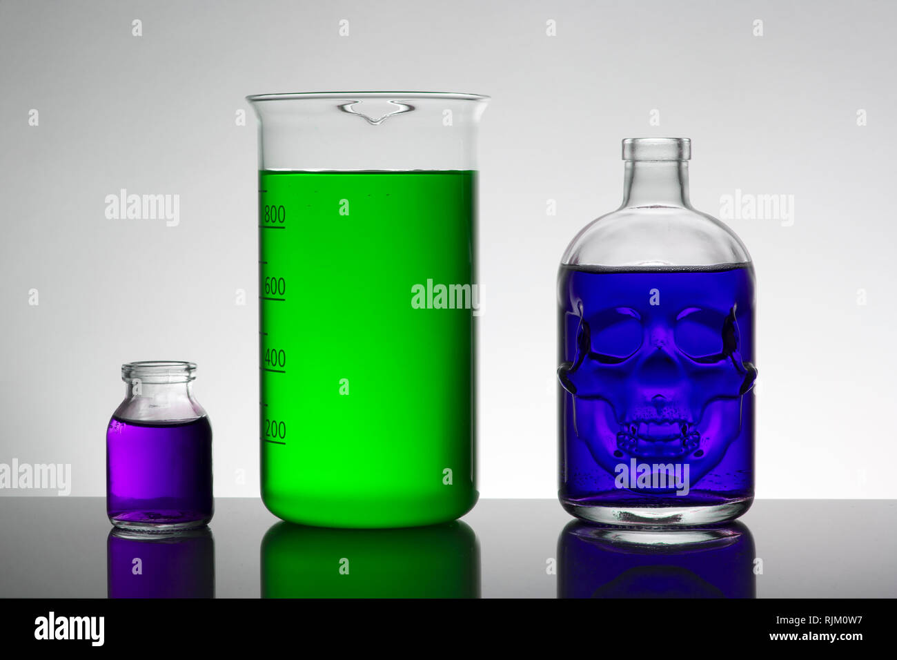 Liquid in laboratory bottles. Scientific biochemical laboratory ...